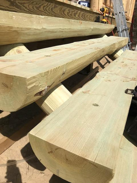 Treated Half Log Staircase - Homestead Timbers